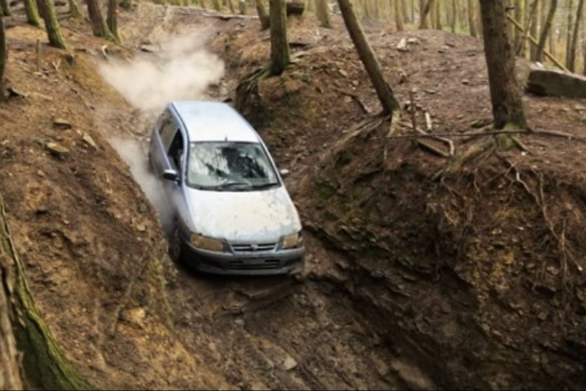 $247 Beater Car Takes Nasty Thrashing in Off-Roading Video - alt_driver