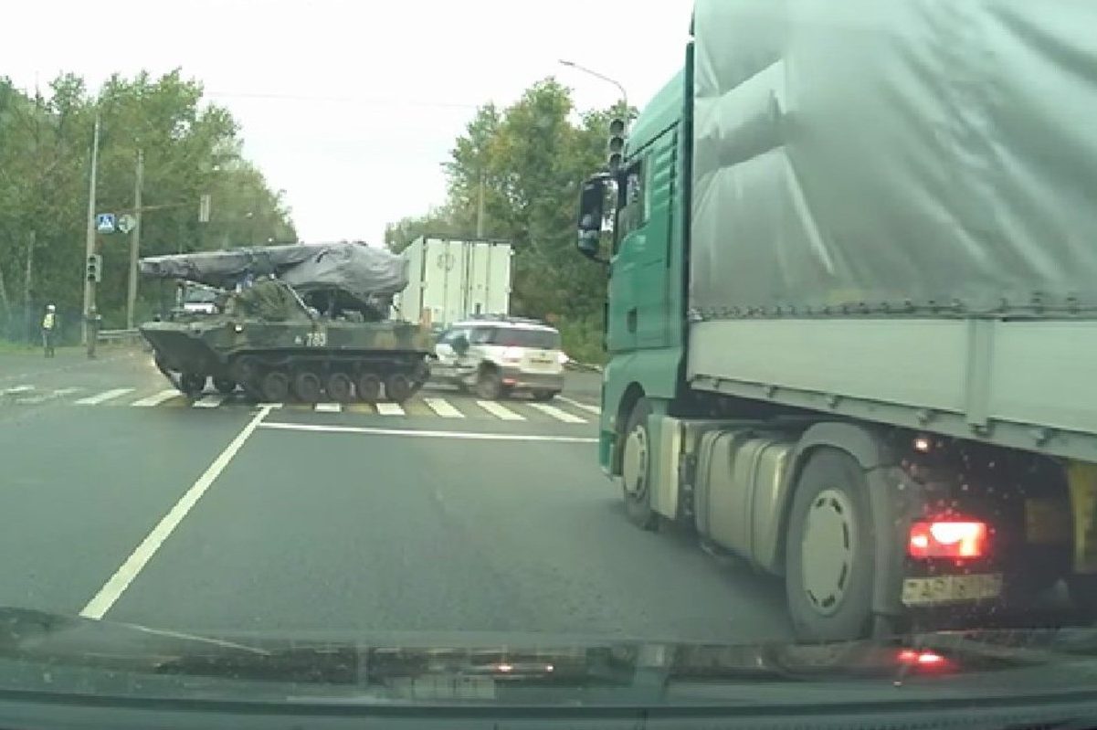 Military Armored Vehicle Nails Car in Intersection - alt_driver